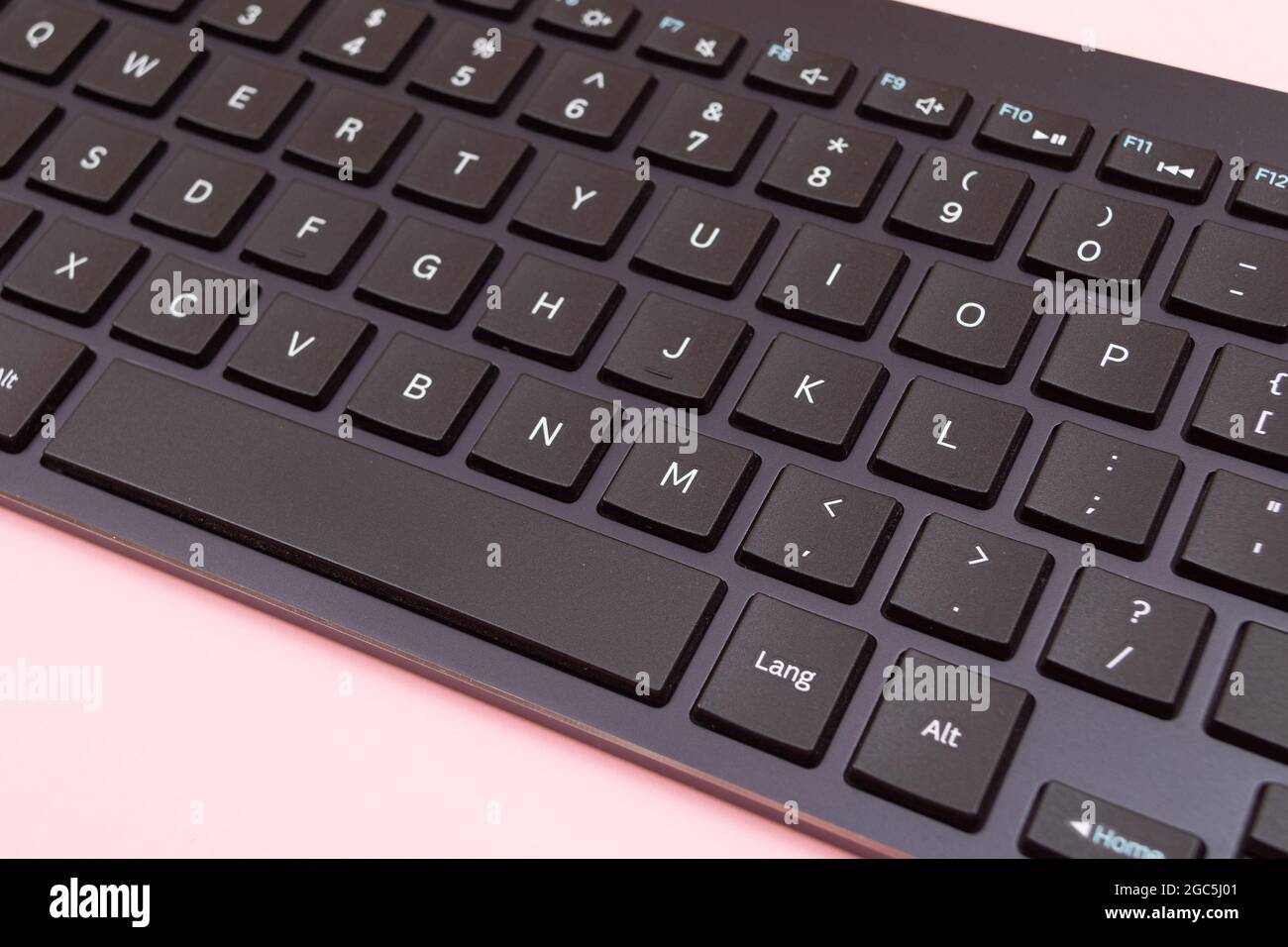 Black Bluetooth Keyboard for Tablet or PC on Pink Background Stock ...