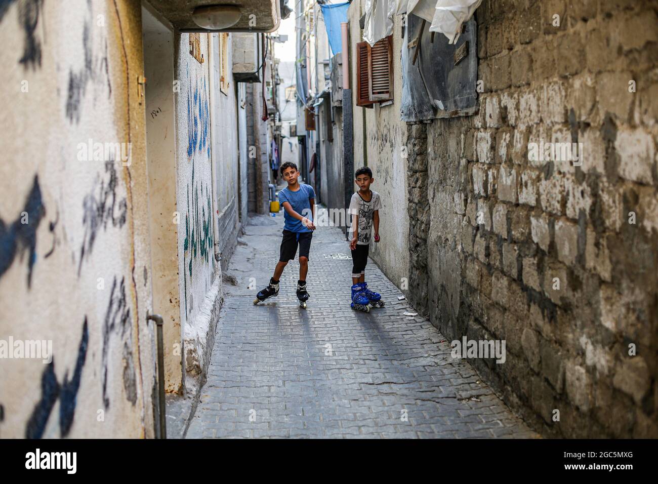Gaza, Palestine. 06th Aug, 2021. Palestinian children play skating in ...