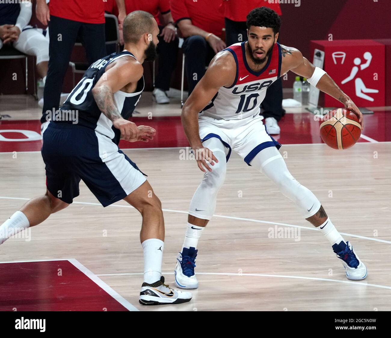 USA's Jayson Tatum (right) and France's Evan Fournier in action during ...