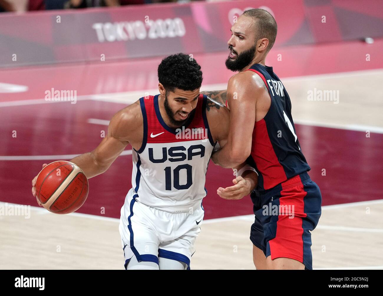 USA's Jayson Tatum (left) and France's Evan Fournier in action during ...