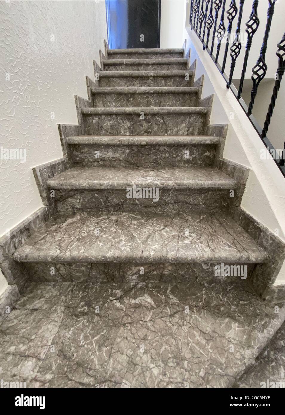 Closeup of granite steps and cast iron handrail Stock Photo - Alamy