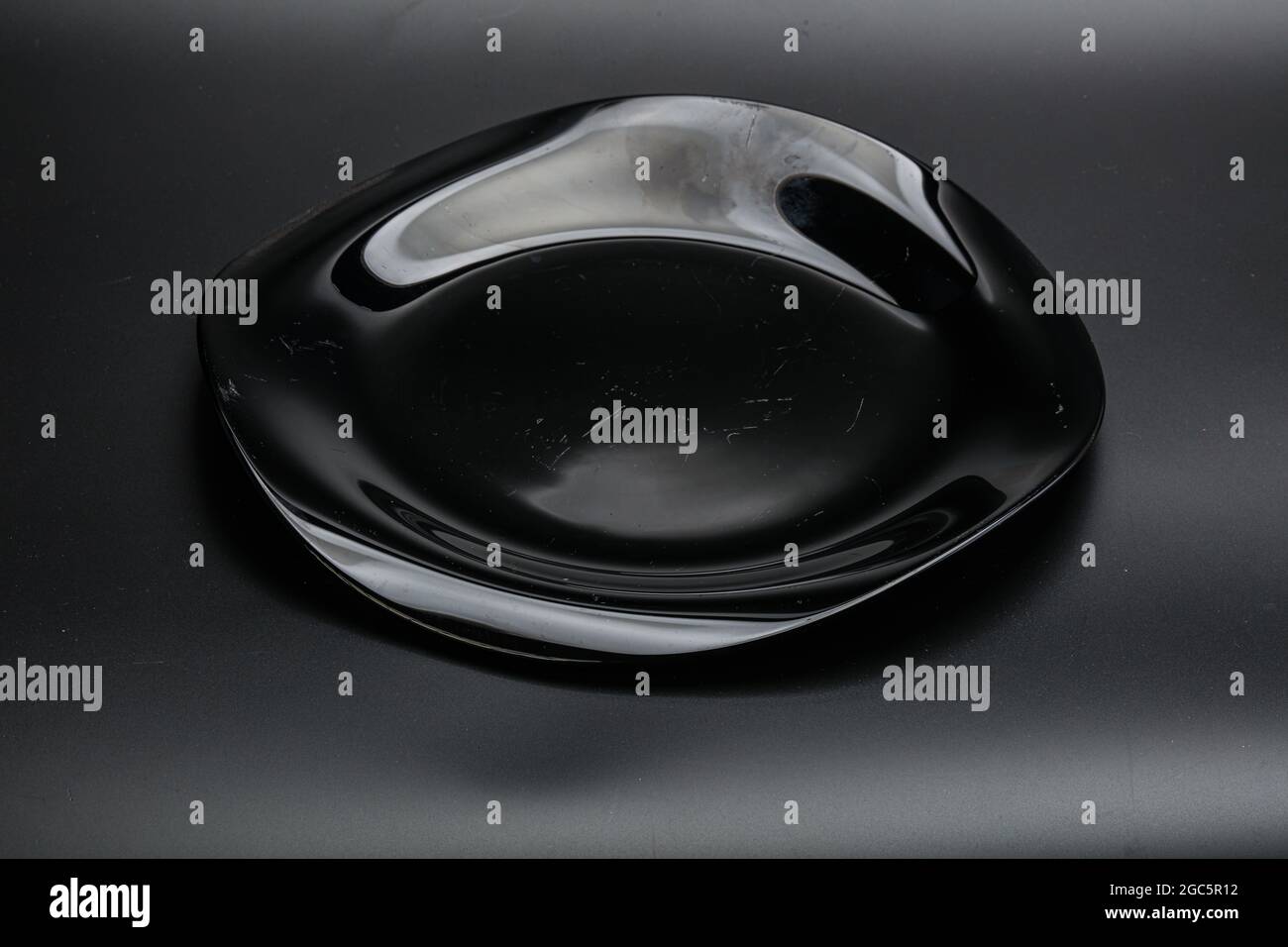 Empty color plate for kitchen isolated Stock Photo - Alamy