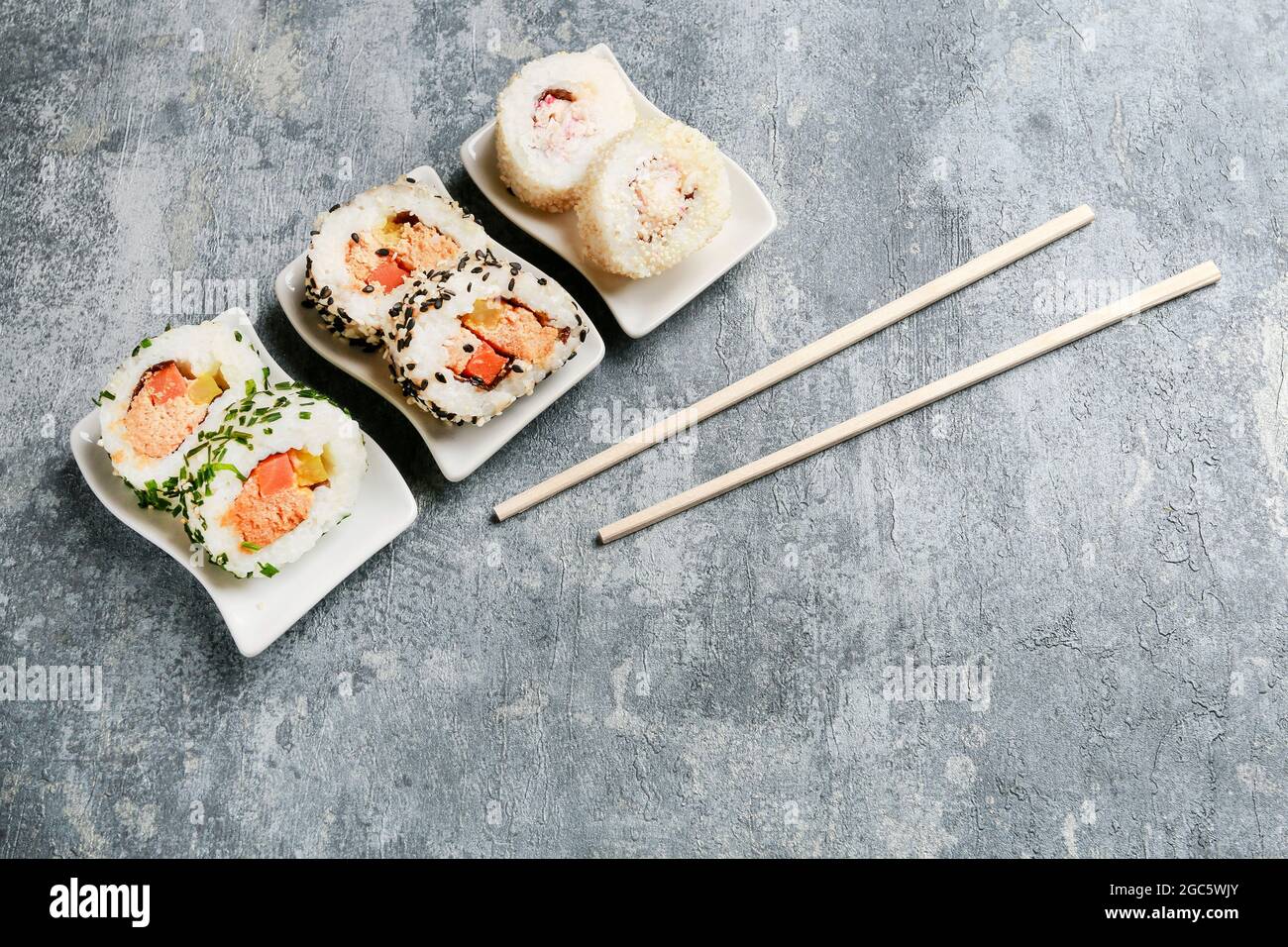 Sushi set on grey stone background. Healthy food Stock Photo - Alamy