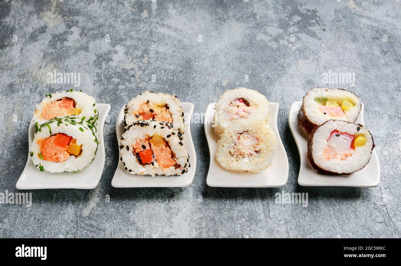 Sushi set on grey stone background. Healthy food Stock Photo - Alamy