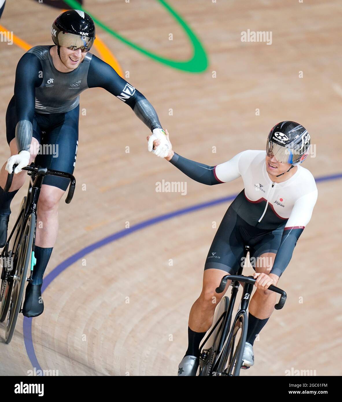 Japan's Yuta Wakimoto (right) celebrates qualifying with New Zealand's ...