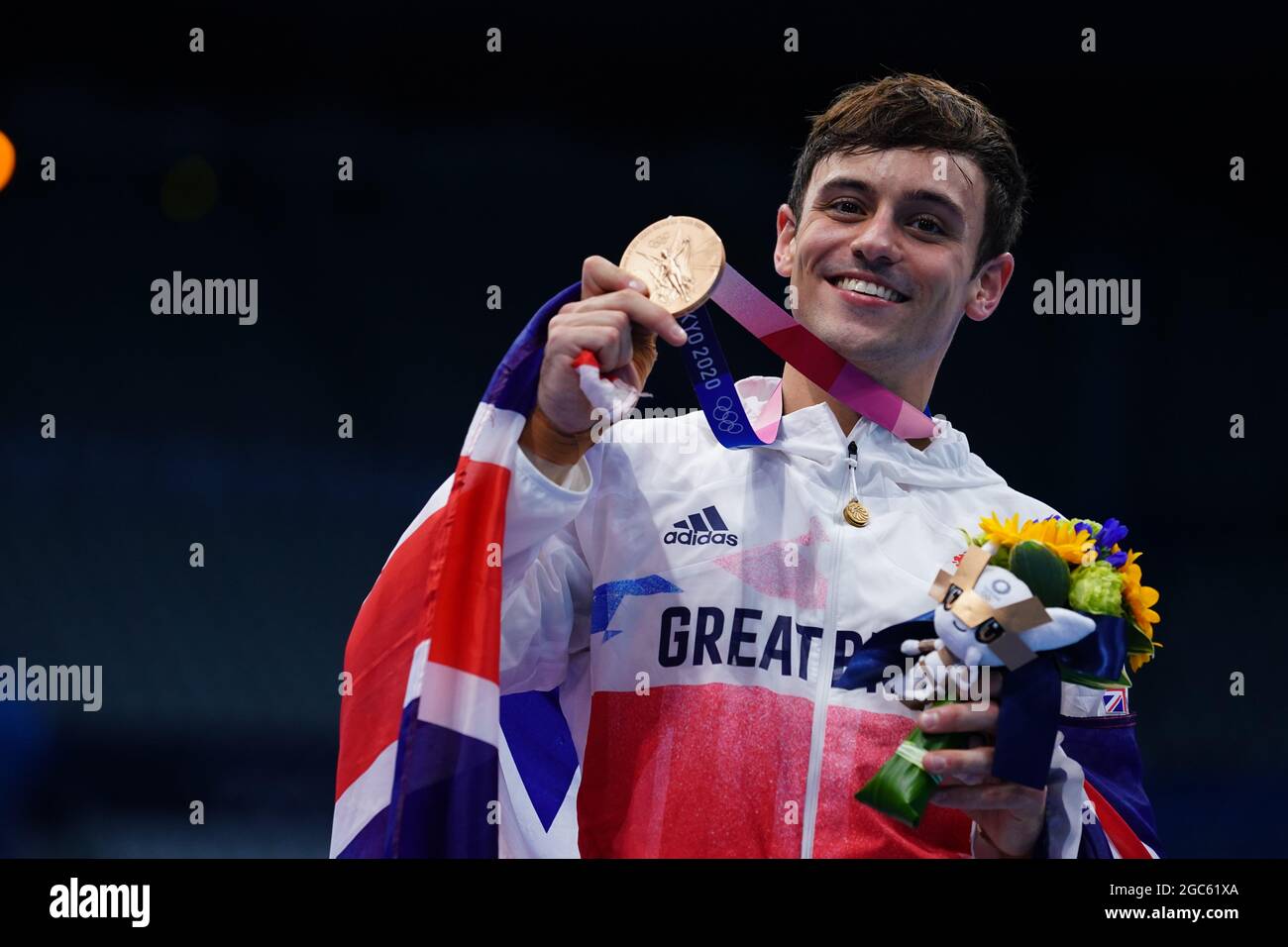 Tom Daley of Great Britain with a bronze medal following the Men's 10m ...