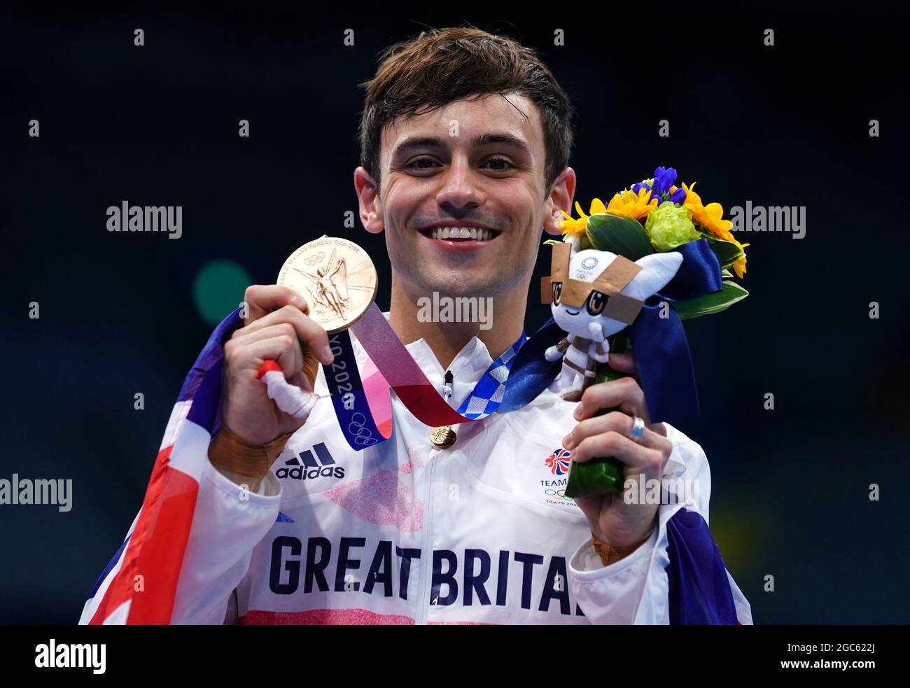 Tom Daley of Great Britain with a bronze medal following the Men's 10m ...
