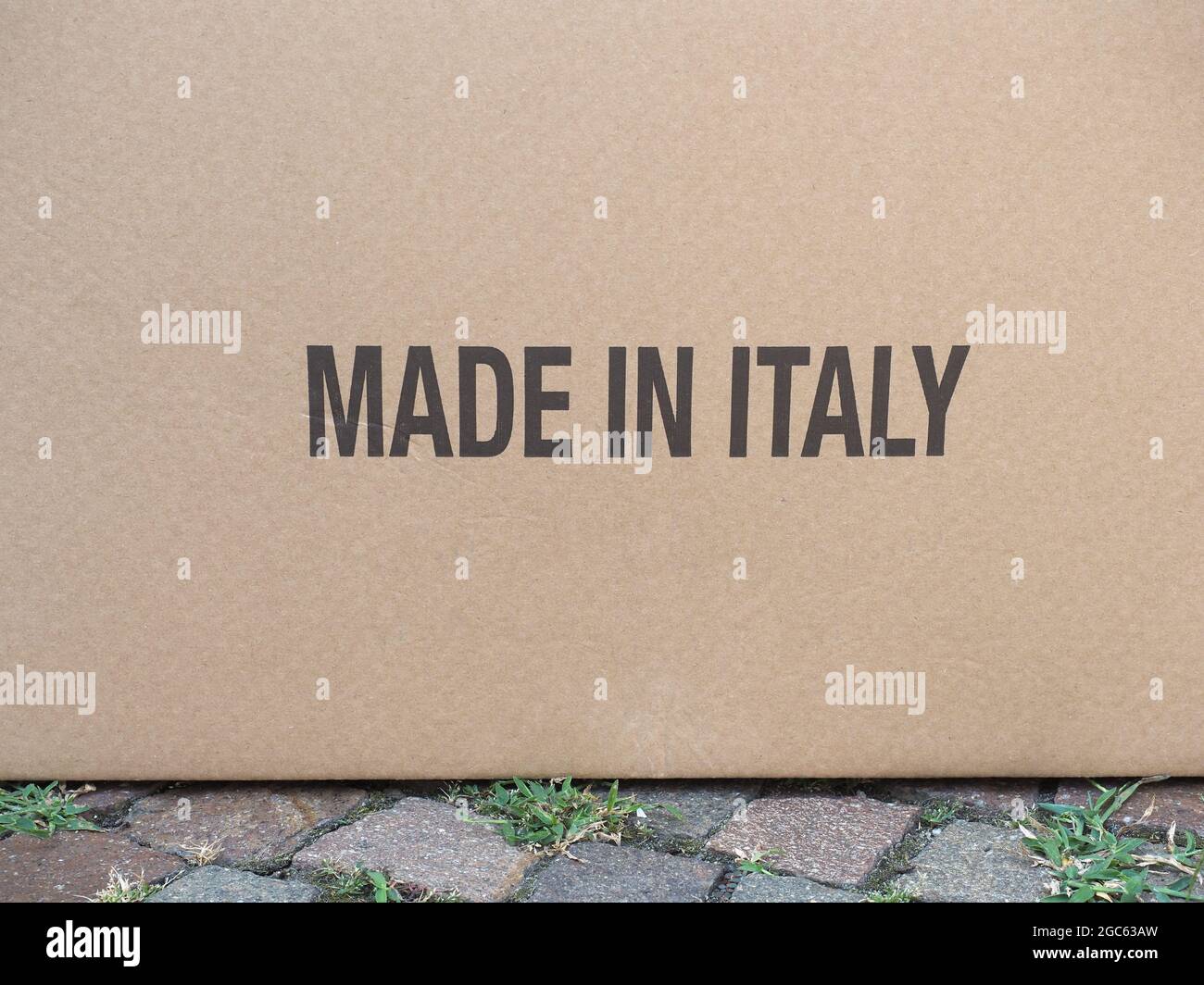 made in Italy label on a corrugated cardboard box Stock Photo - Alamy