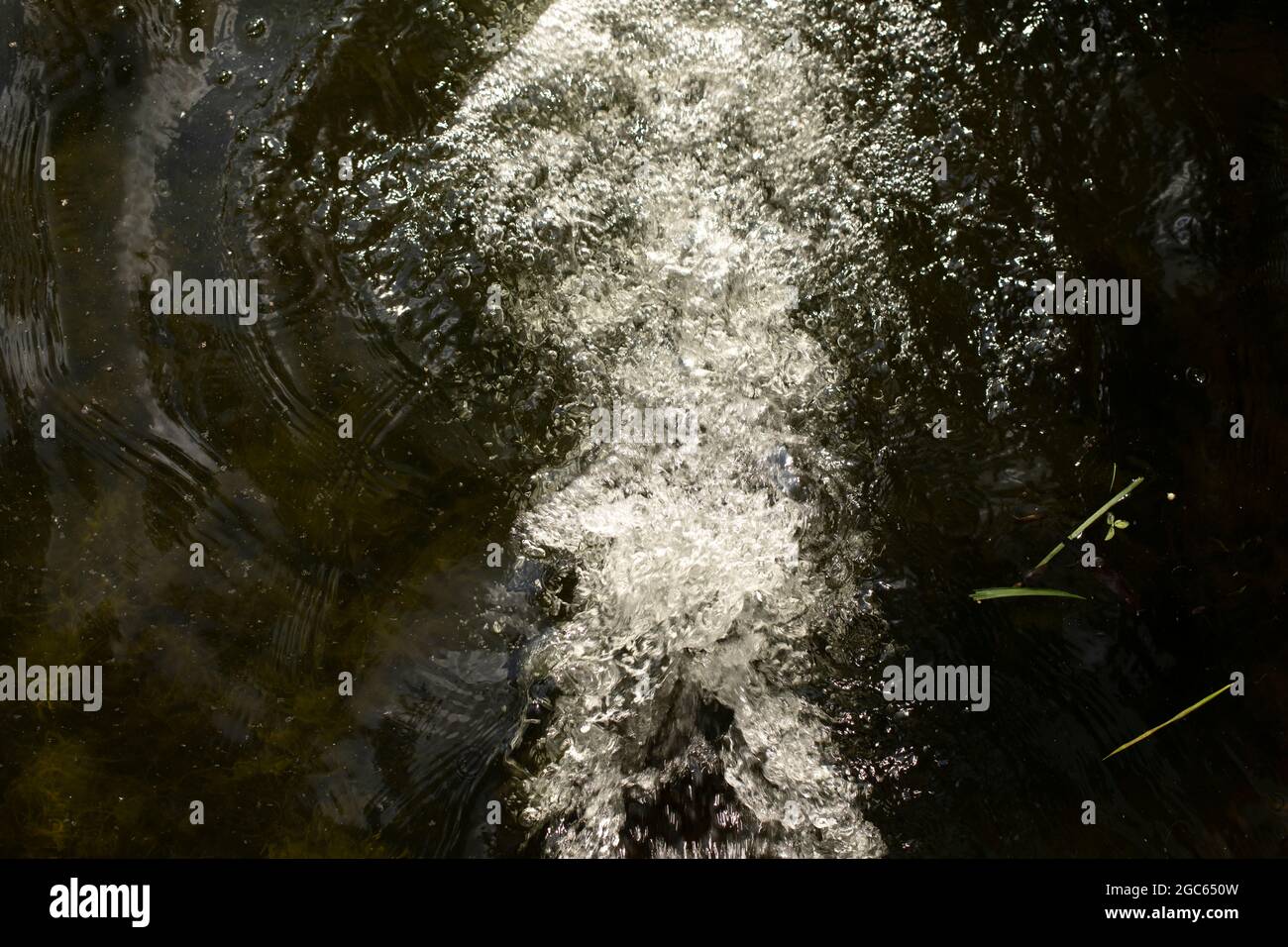 The flow of water in the pond. The bubbling movement of water. Draining ...