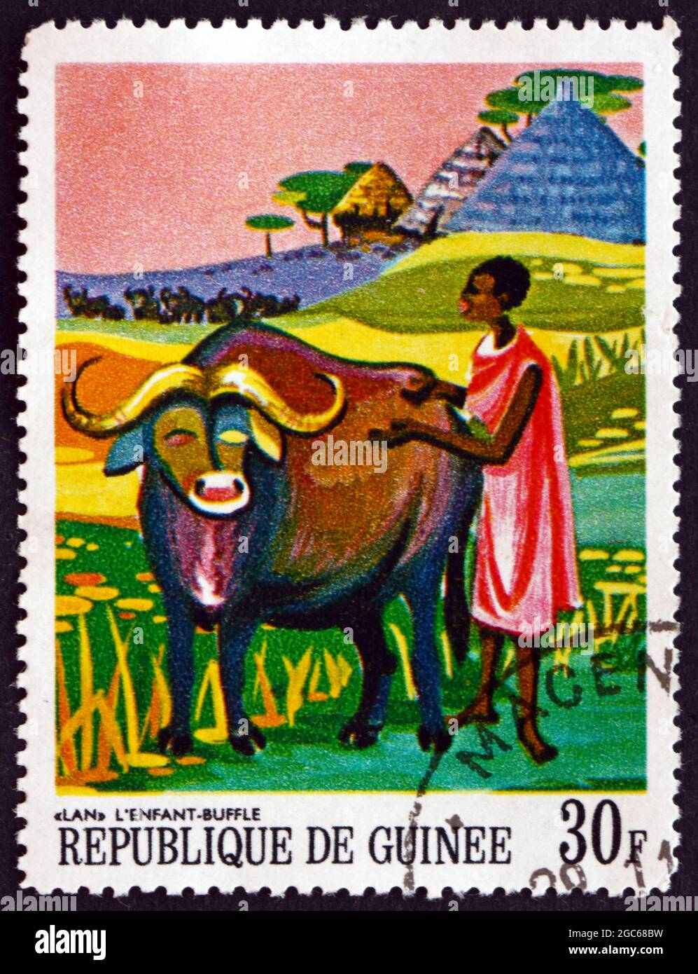 GUINEA - CIRCA 1967: a stamp printed in Guinea shows Lan, the Child ...