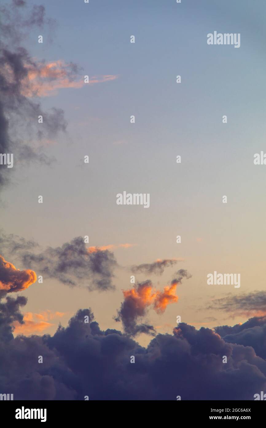 The setting sun light up some of the cloud cover Stock Photo - Alamy