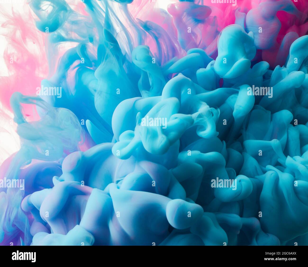 Ink drop in water background Stock Photo - Alamy