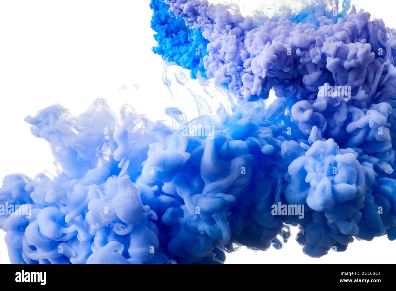 Ink drop in water isolated on white background Stock Photo - Alamy