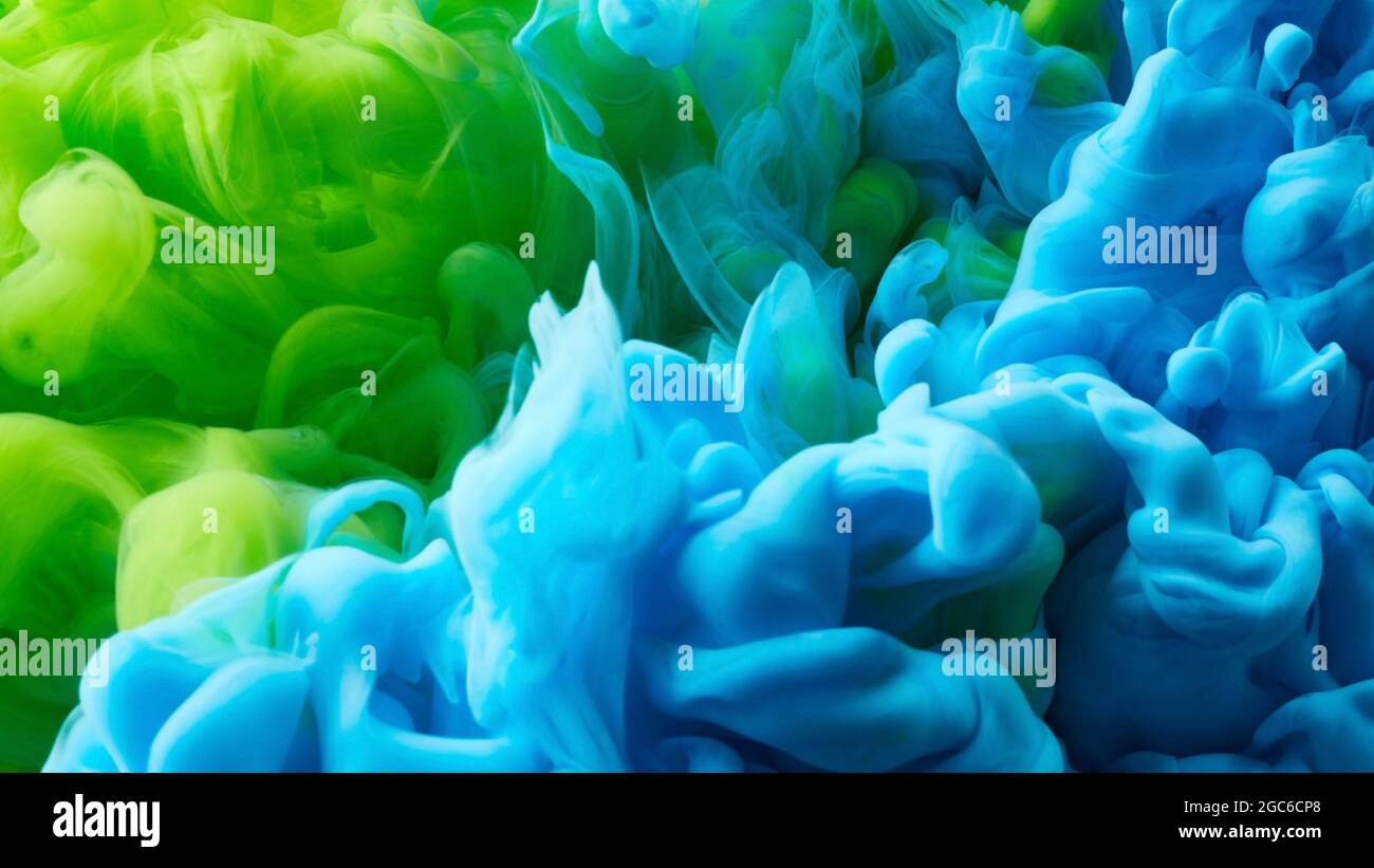 Ink drop in water background Stock Photo - Alamy