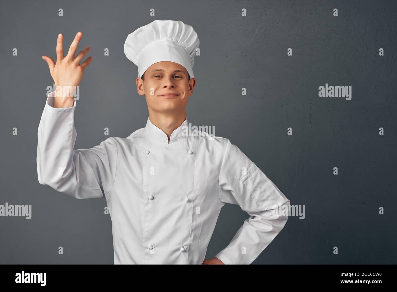 emotional chef gestures with his hand to a professional foodie Stock ...