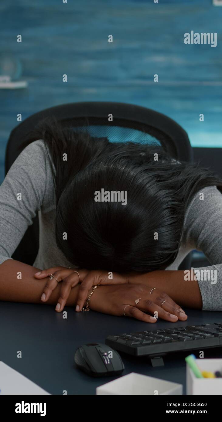 Disappointed workaholic student sleeeping on hi-res stock photography ...