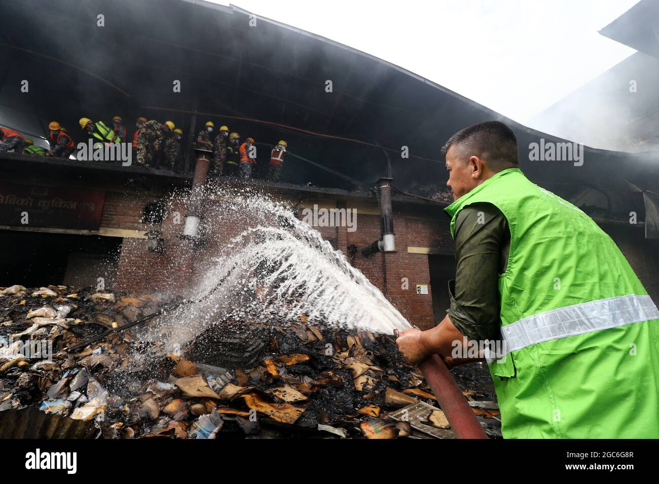 Kathmandu, NE, Nepal. 7th Aug, 2021. Firefighters from the Armed Police ...