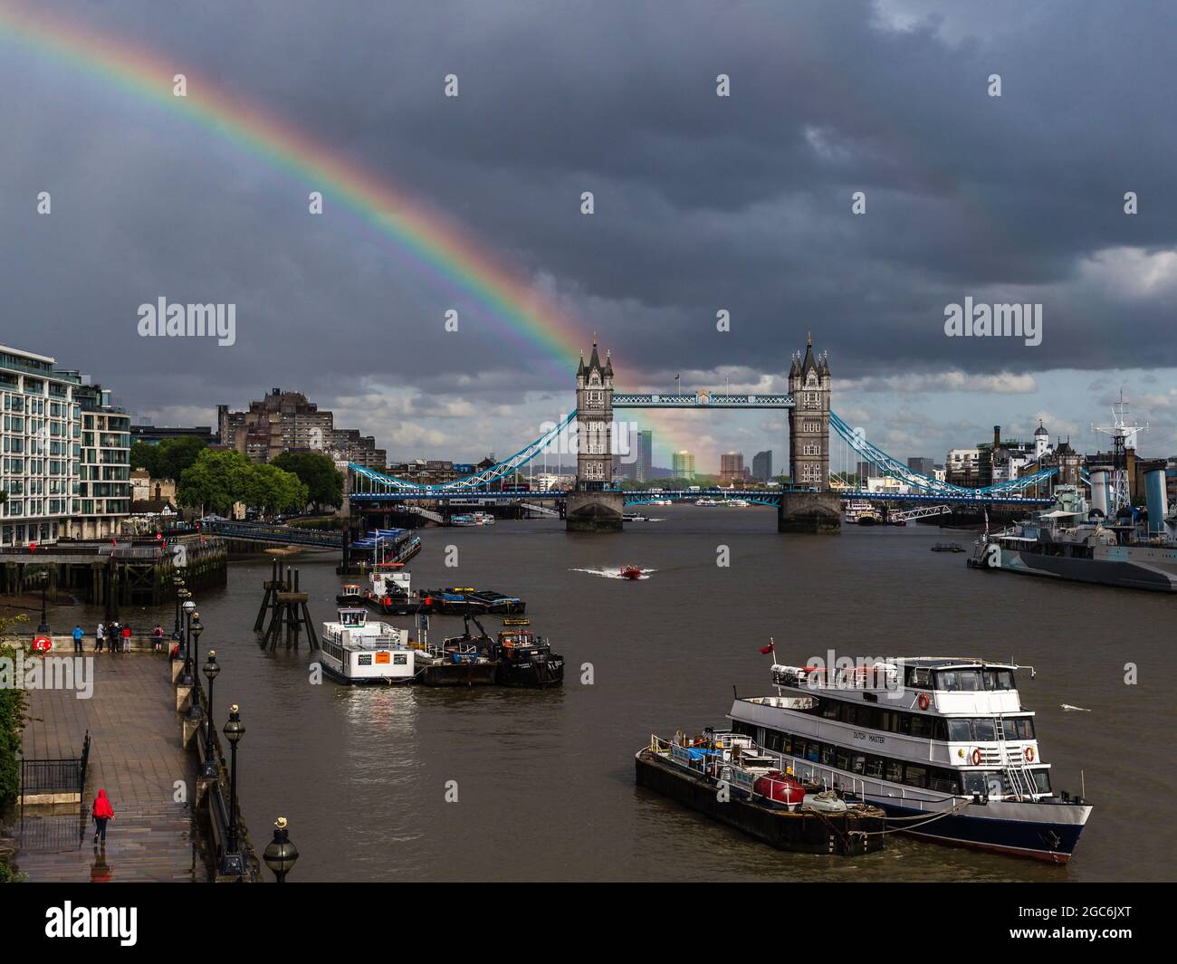 Busy river thames, and a beautiful rainbow over iconic Tower Bridge in ...