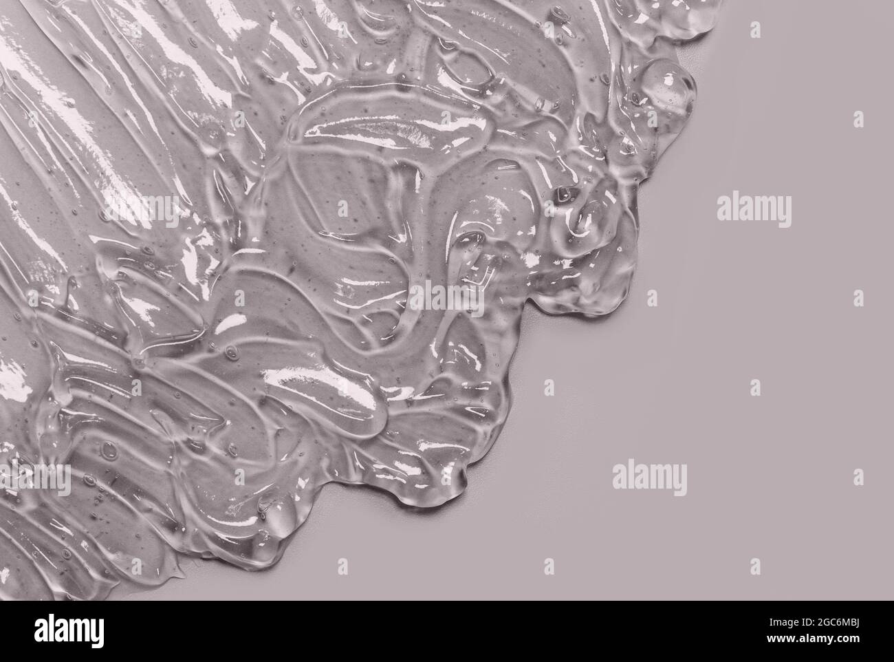 Liquid cream gel cosmetic smudge drops texture grey background Stock ...