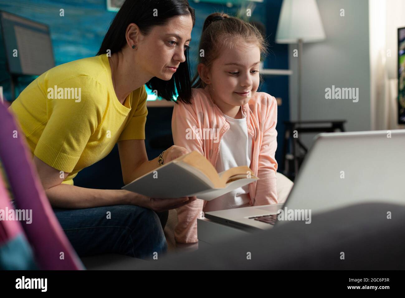 Child giving book hi-res stock photography and images - Alamy