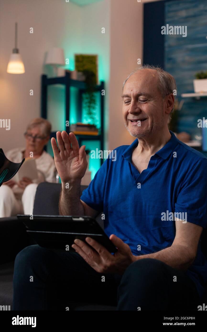 Old man waving hi-res stock photography and images - Alamy