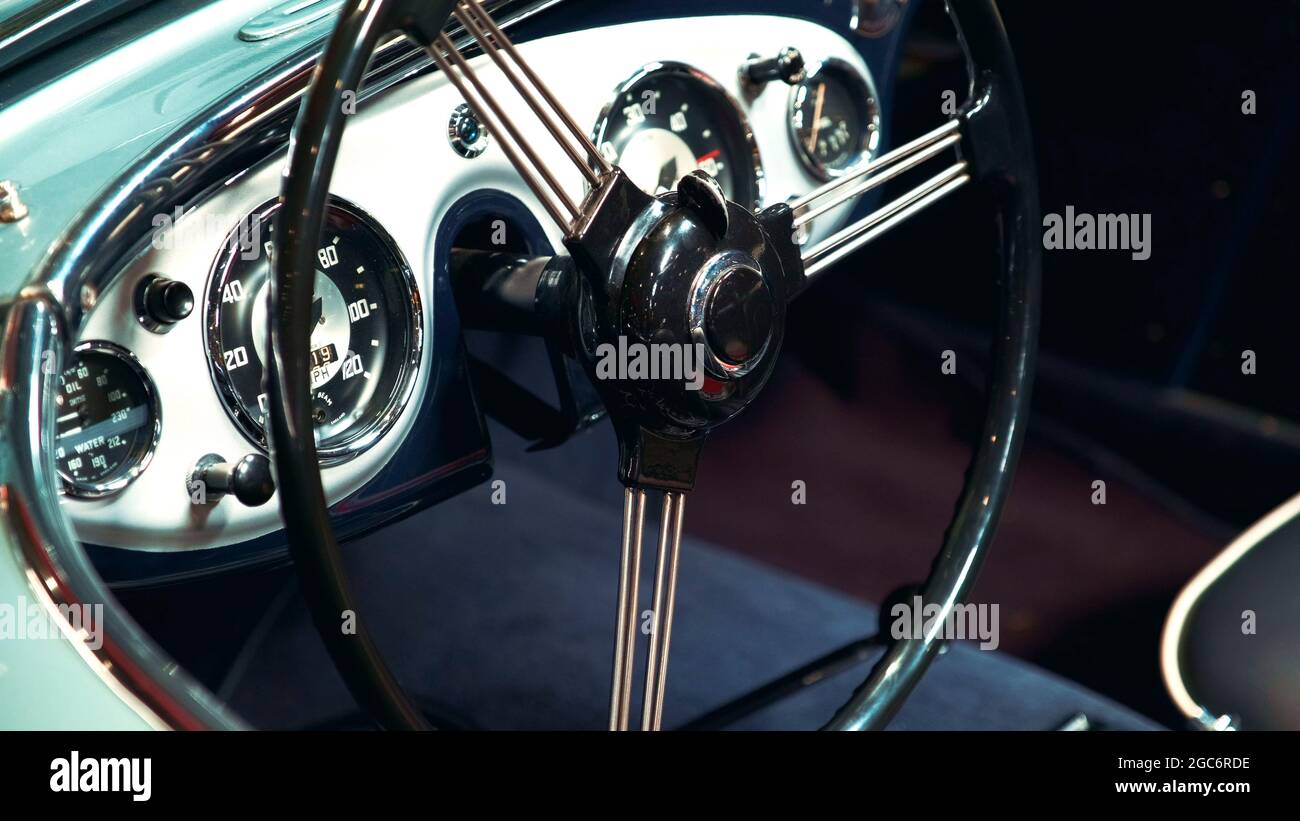 Close-up of black-metal steering wheel of vintage vehicle. Classic ...