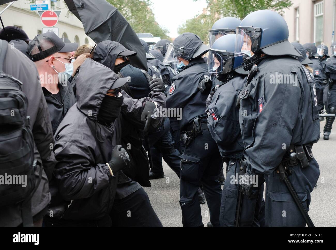Weimar, Germany. 07th Aug, 2021. Police officers stop participants of a ...