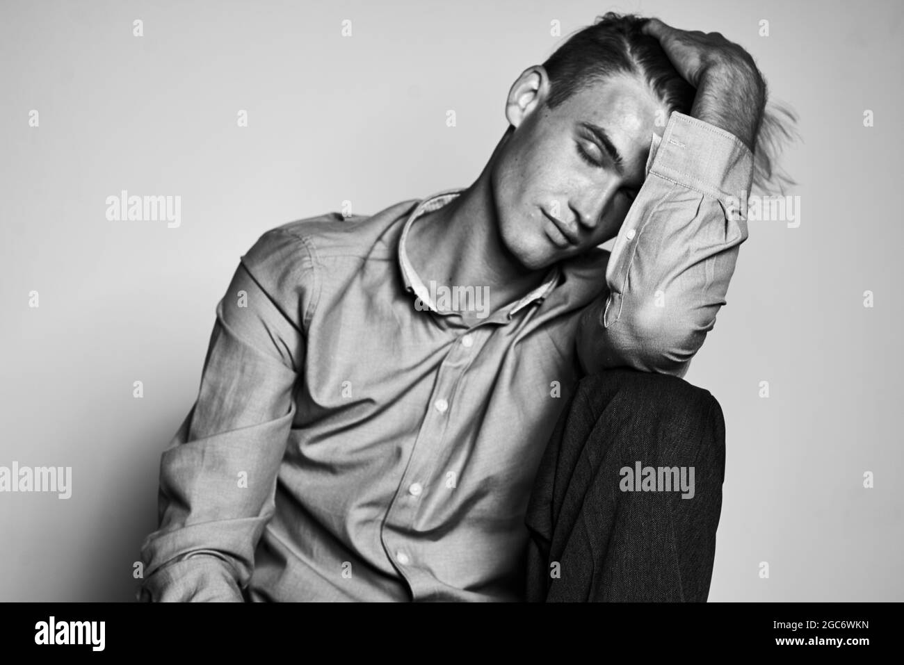 handsome man in shirt fashion hairstyle posing gray background Stock ...