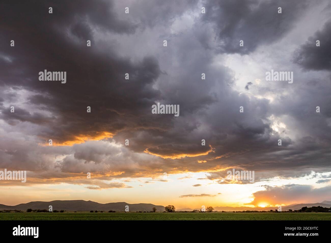 Usa, Idaho, Bellevue, Storm clouds over fields at sunset Stock Photo ...