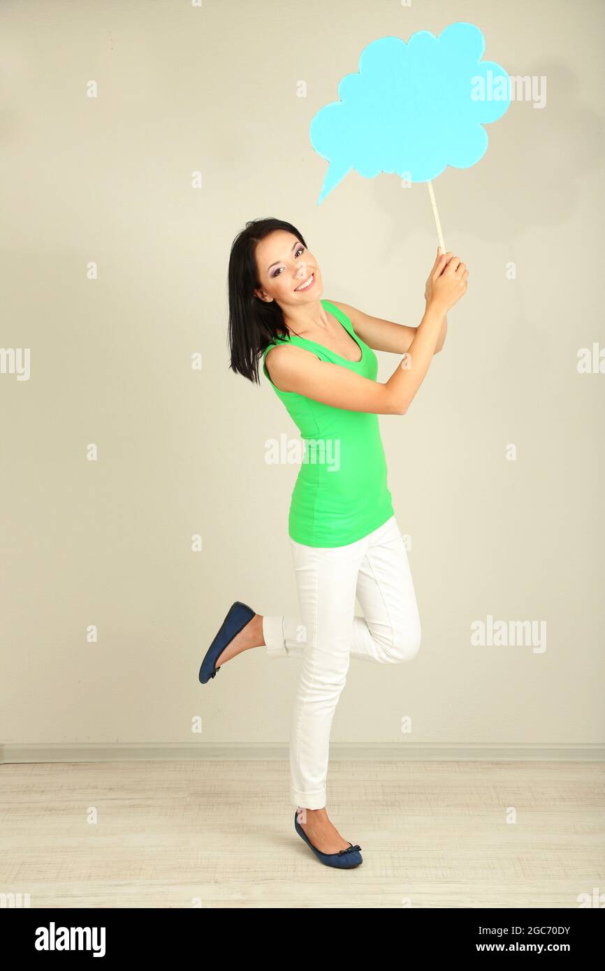 Thought girl in bubble next to it on grey background Stock Photo - Alamy