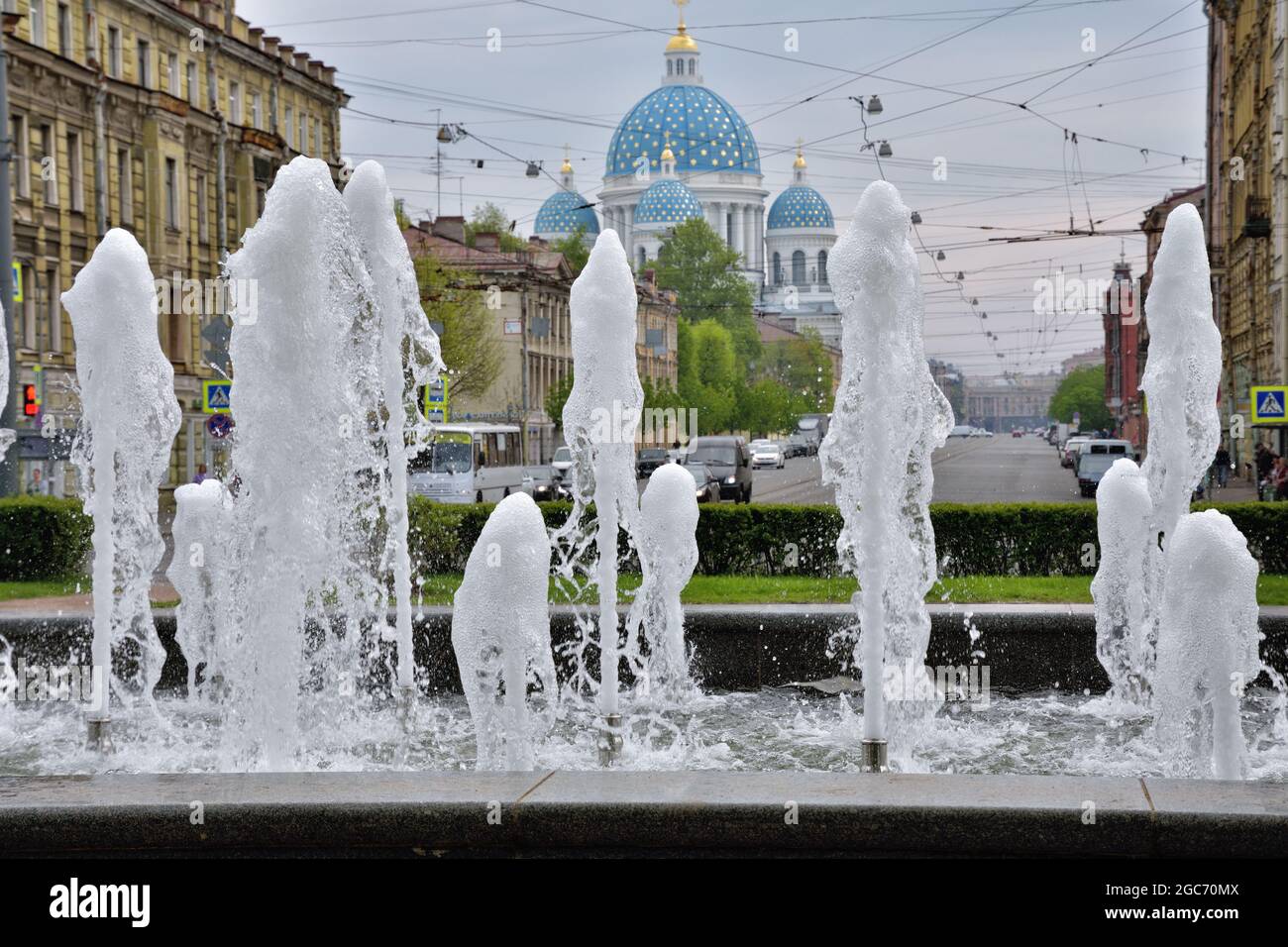 In the summer, fountains are turned on in the city.It is cool around ...