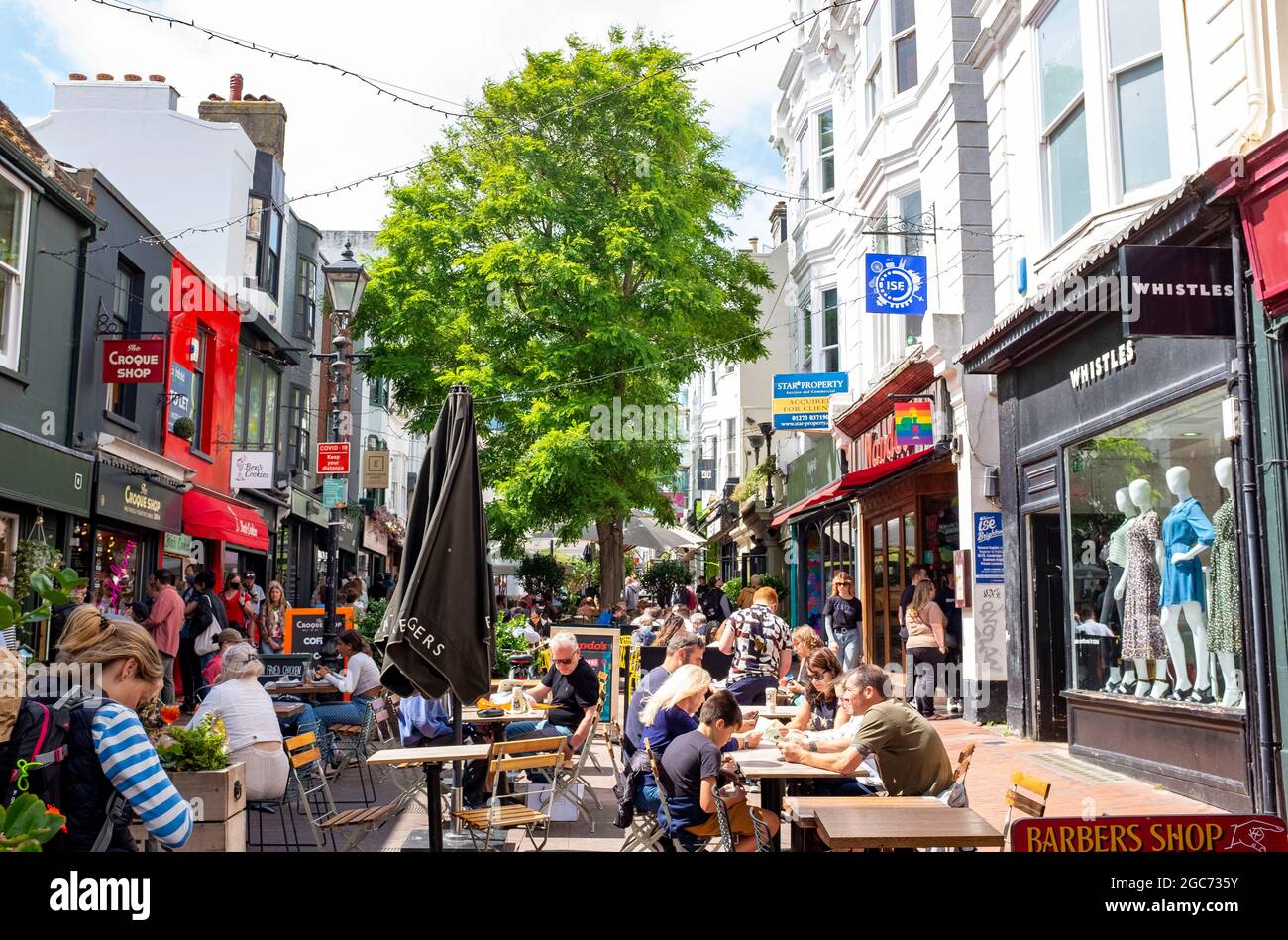 People enjoy eating outside at cafes and restaurants in Duke Street ...