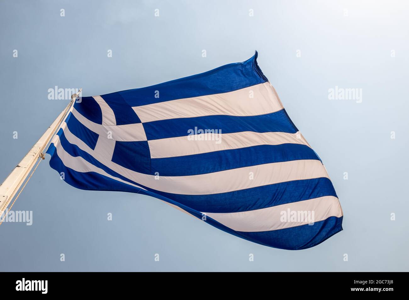 Athens, August 4th 2021: The Greek national flag flying over the ...
