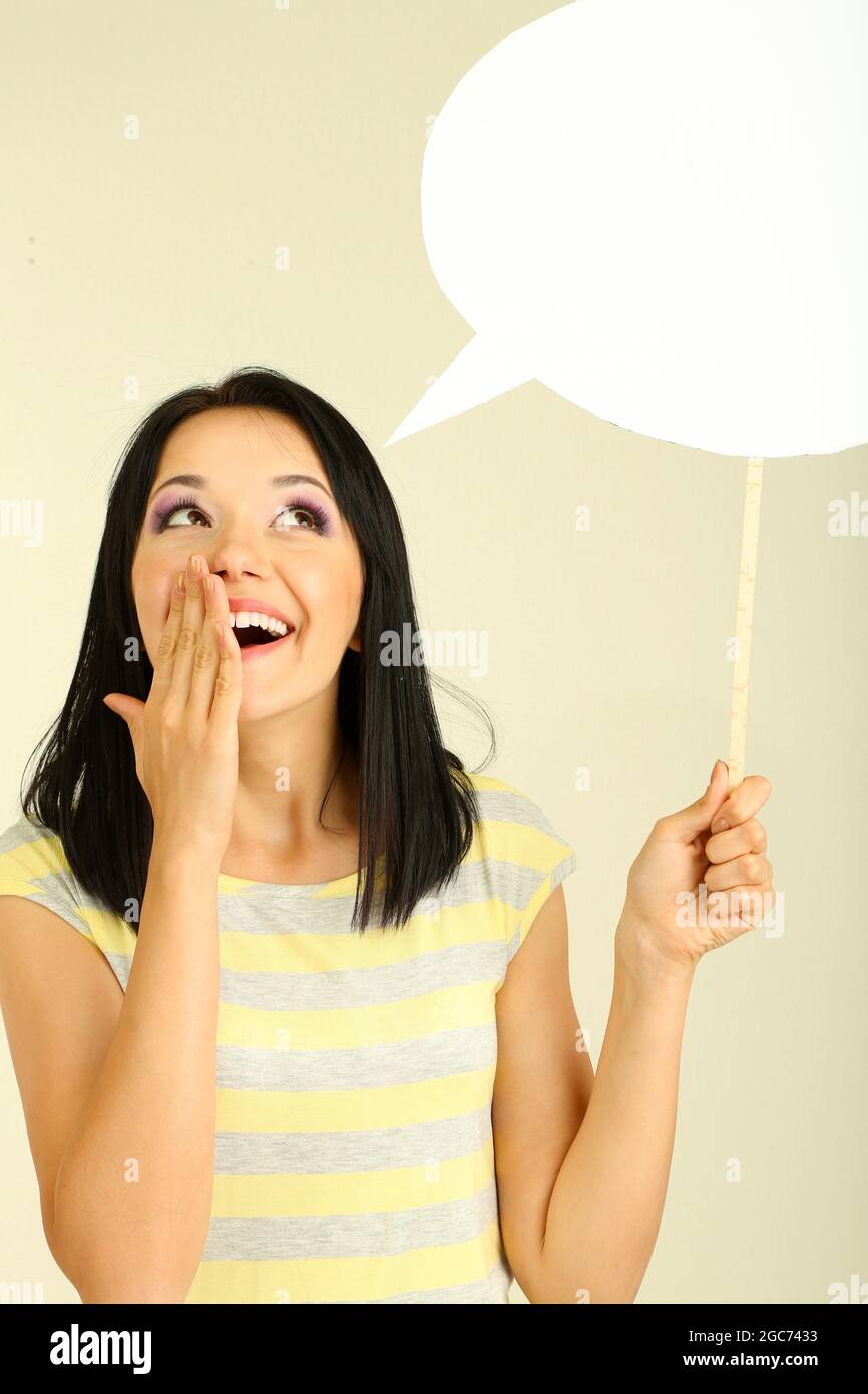 Thought girl in bubble next to it on grey background Stock Photo - Alamy