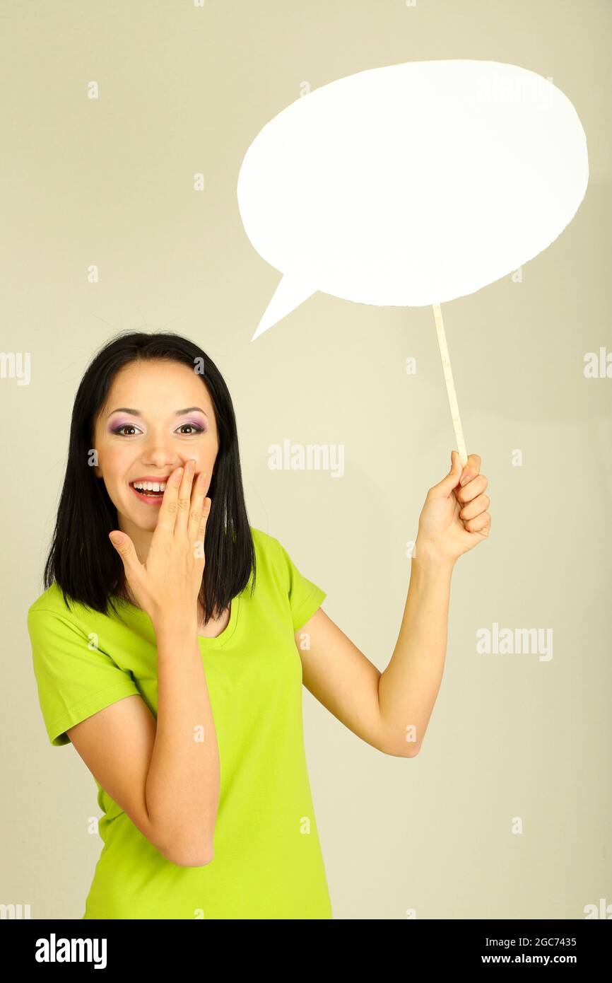 Thought girl in bubble next to it on grey background Stock Photo - Alamy