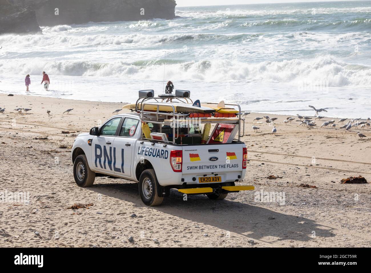 RNLI vehicle driving along the beach in Portreath, Cornwall,UK Stock ...