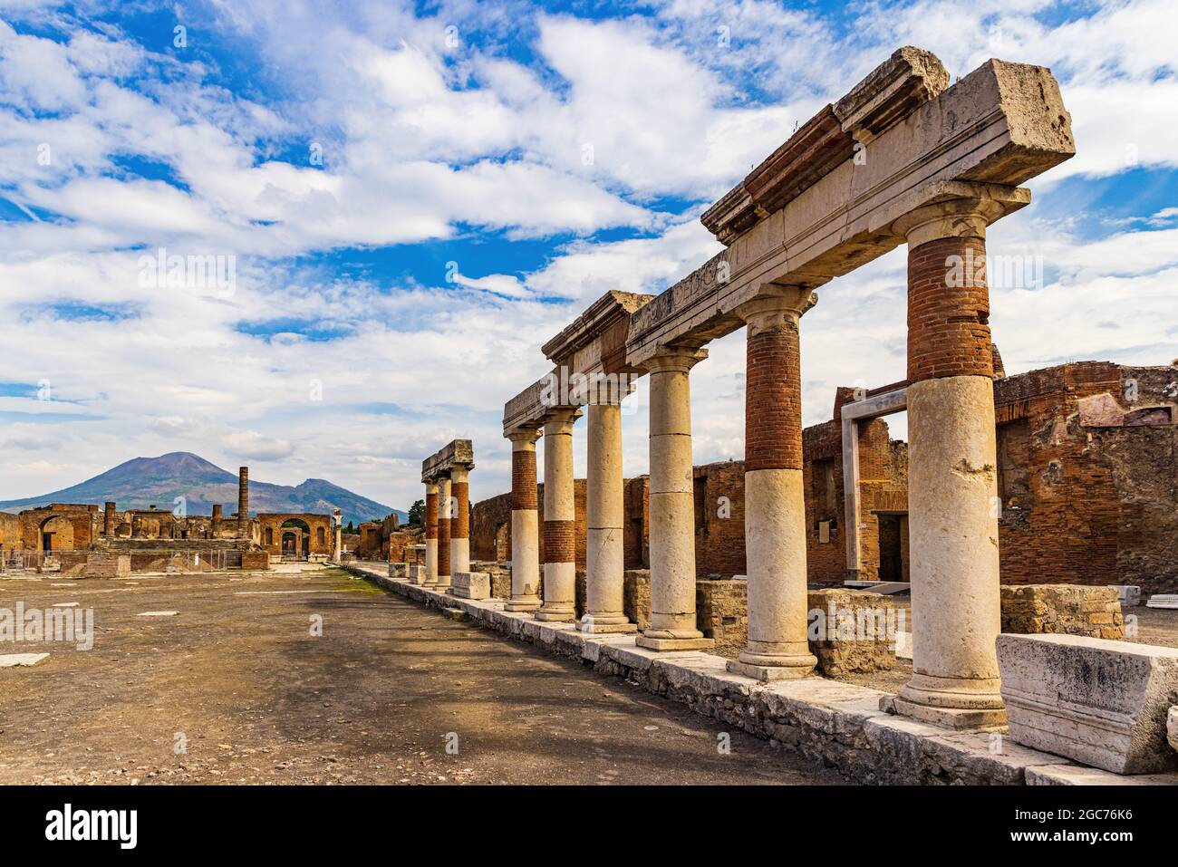 View of Mount Vesuvius through the ruins of the Forum at Pompeii, Italy ...