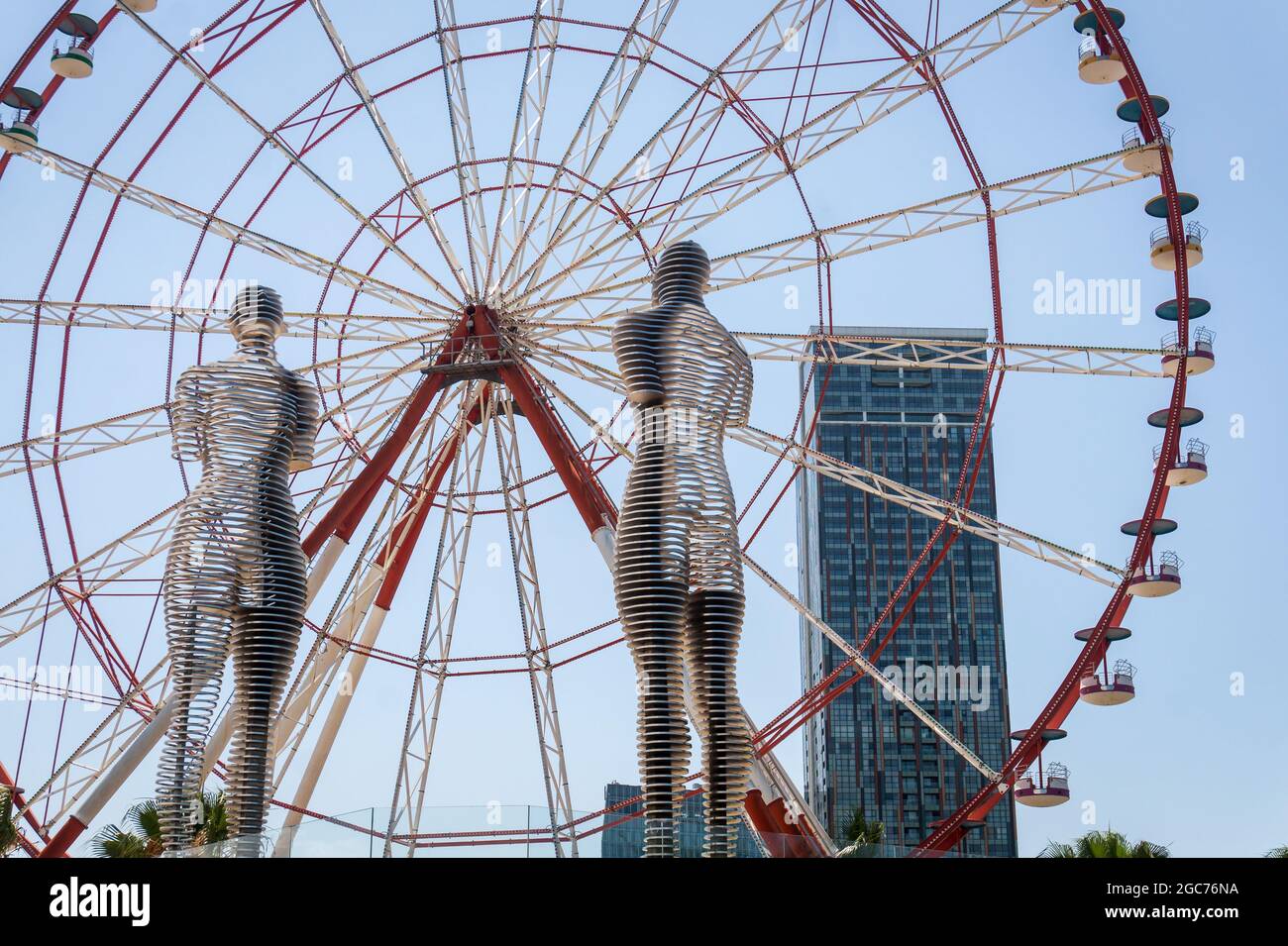 Batumi, Georgia - July 2, 2021: Ali and Nino statue and The Ferris ...