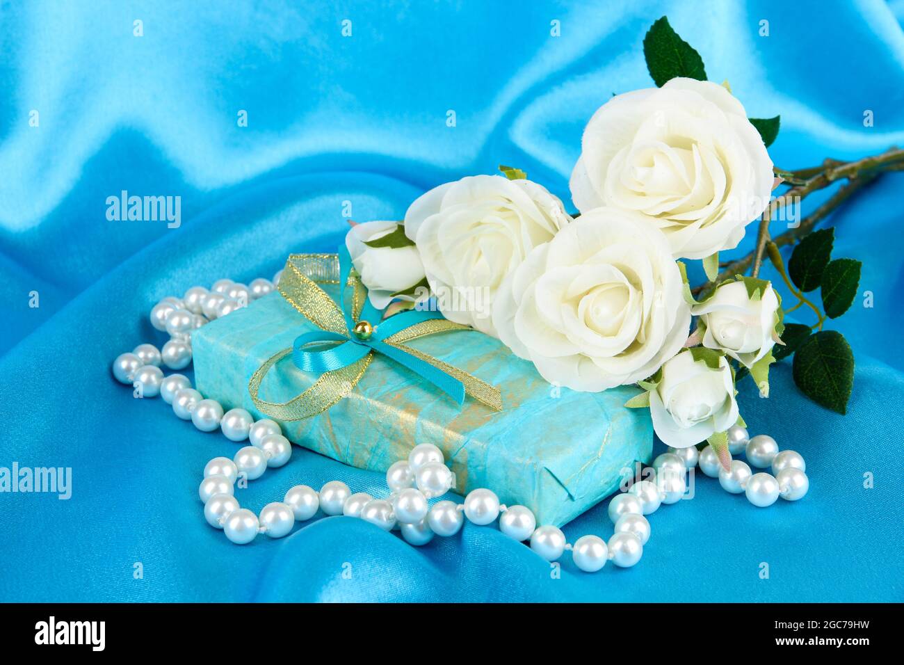 Romantic parcel on blue cloth background Stock Photo - Alamy