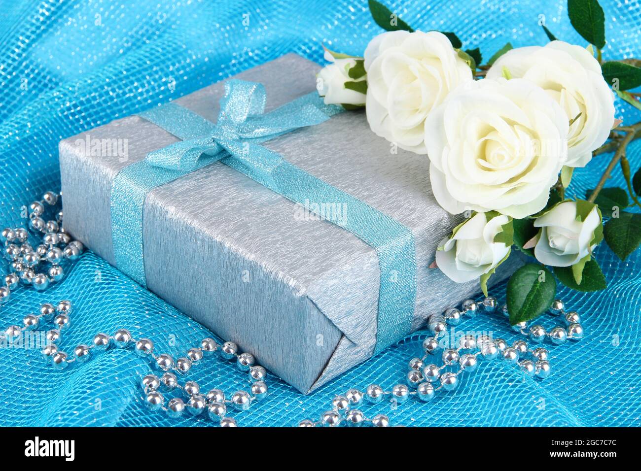 Romantic parcel on blue cloth background Stock Photo - Alamy