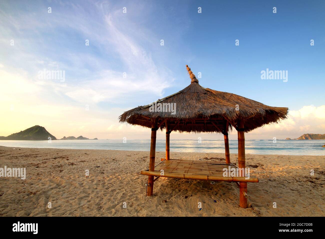 a hut sitting on top of a sandy beach Stock Photo - Alamy