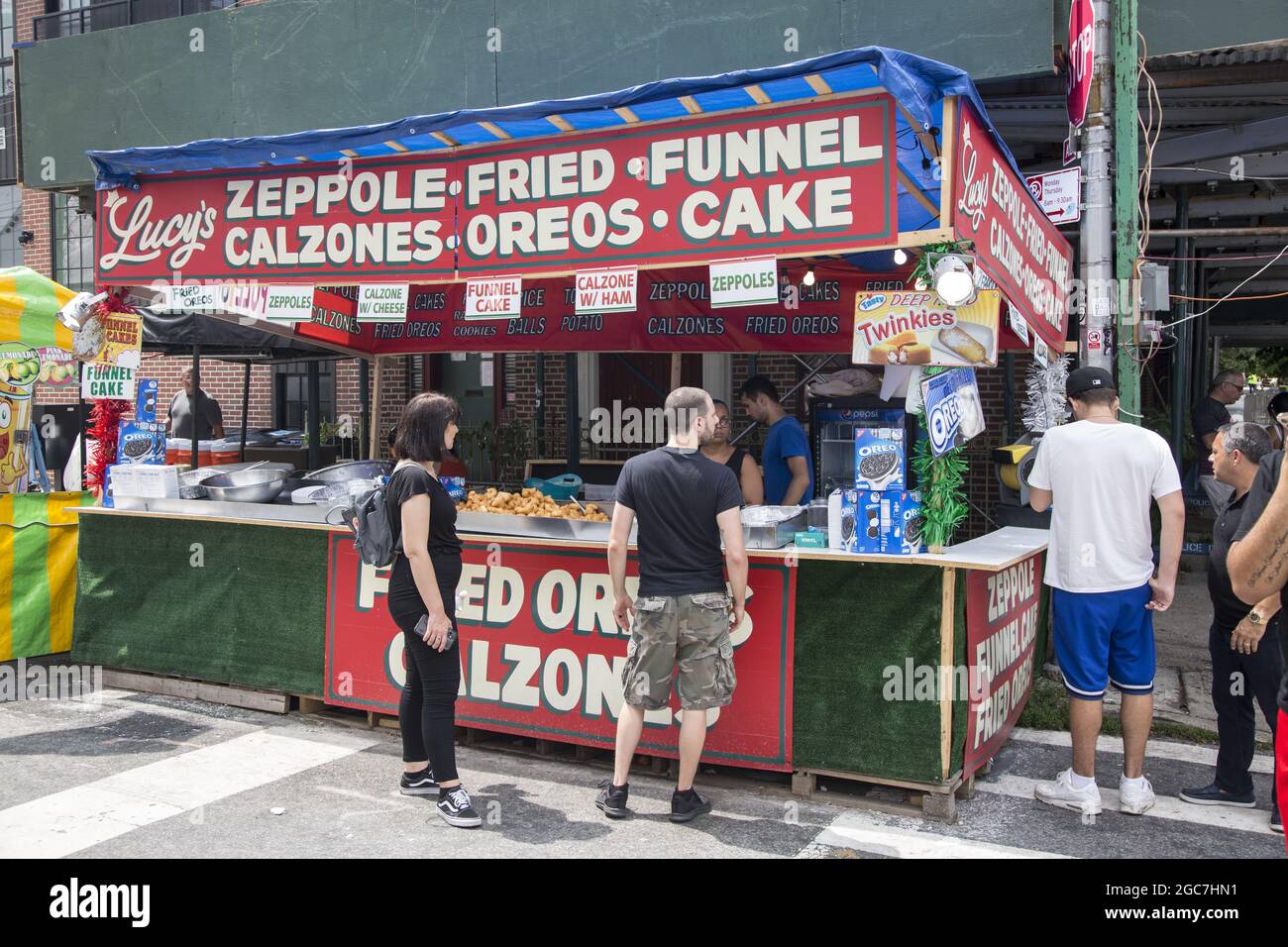 Food vendor at the annual Giglio Parish Feast and lifting of the tower ...
