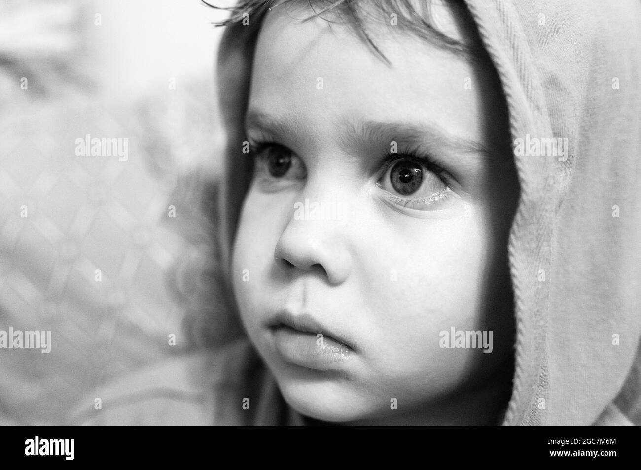 children's candid emotions on the child's face. portrait of a little ...