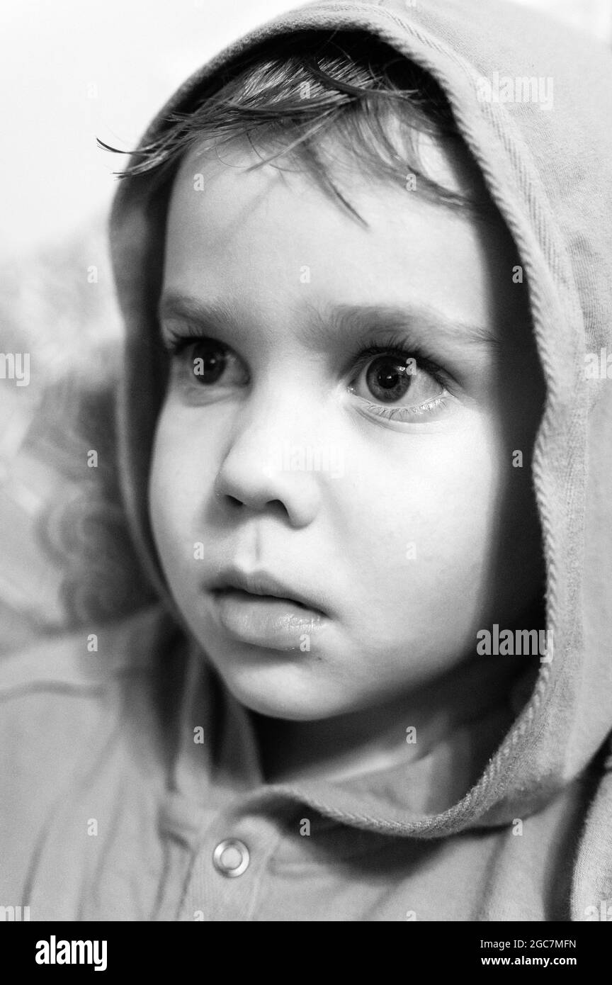 children's candid emotions on the child's face. portrait of a little ...