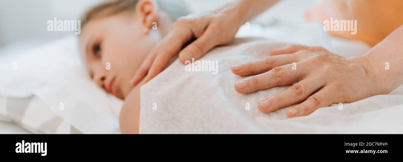 doctor osteopath hands does physiological and emotional therapy for ...