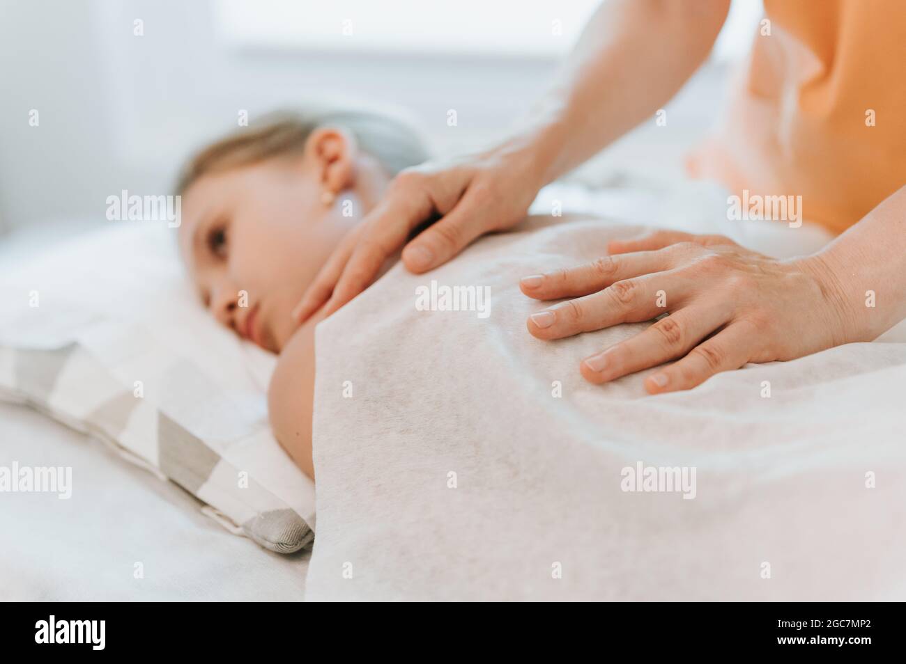 real doctor osteopath hands does physiological and emotional therapy ...