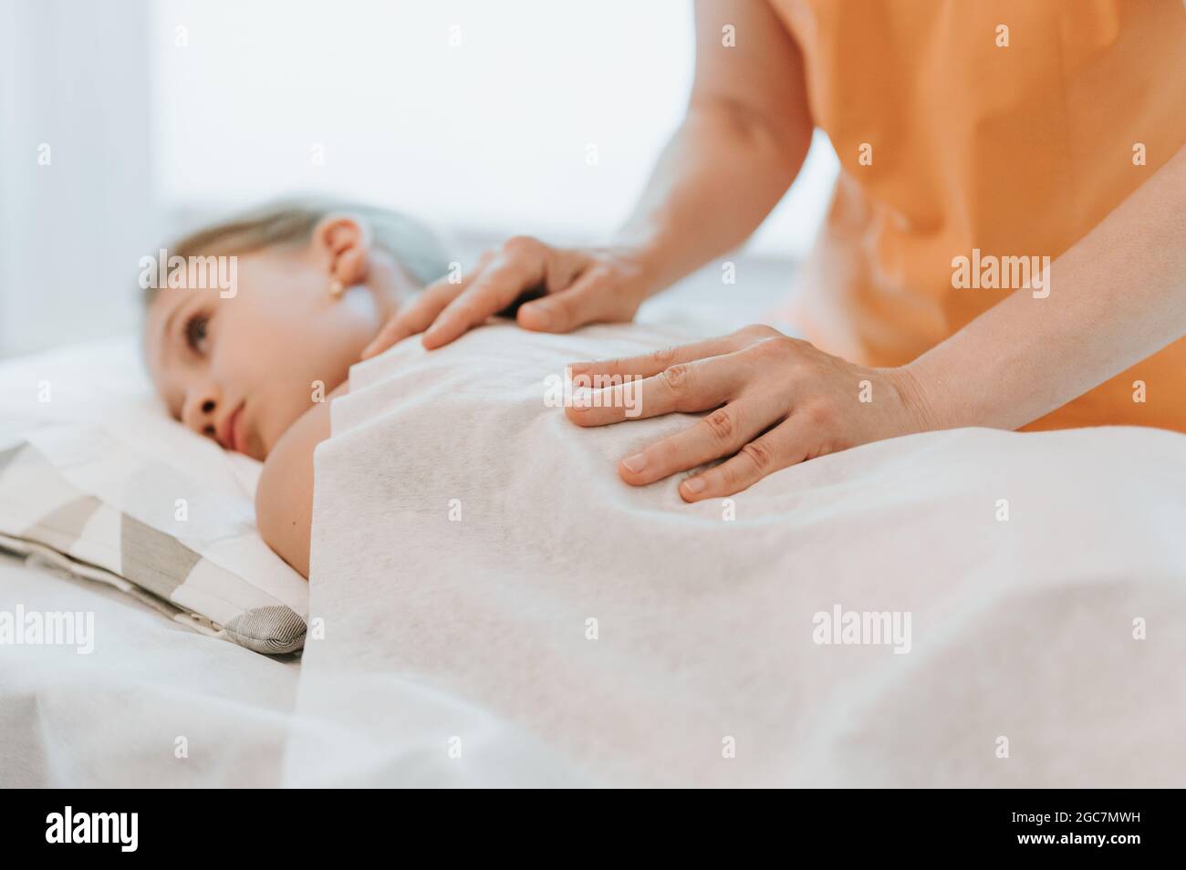 real doctor osteopath hands does physiological and emotional therapy ...