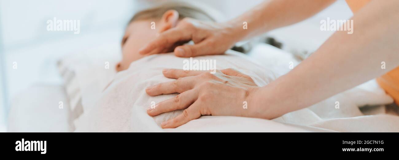 doctor osteopath hands does physiological and emotional therapy for ...