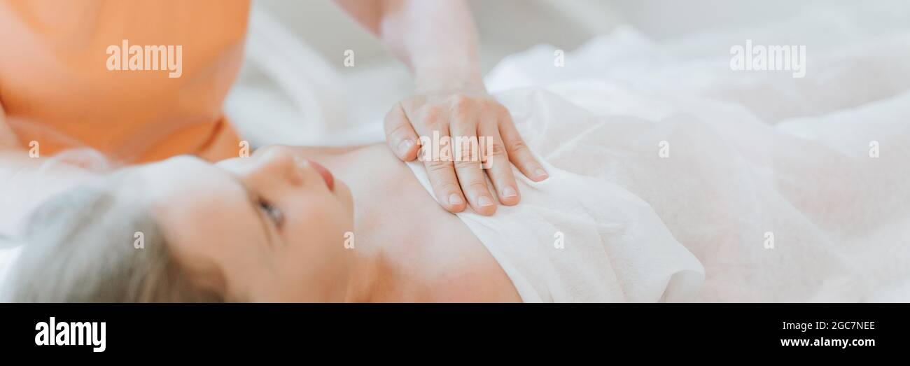 doctor osteopath hands does physiological and emotional therapy for ...