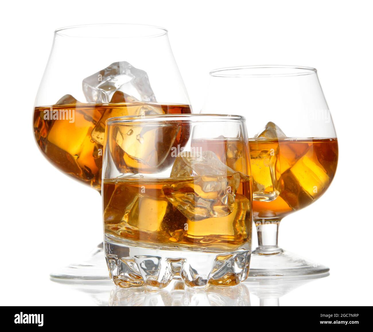 Brandy glasses with ice isolated on white Stock Photo - Alamy